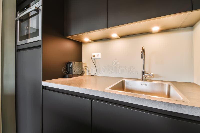 Kitchen Design with Black Kitchen Set Stock Image - Image of empty ...