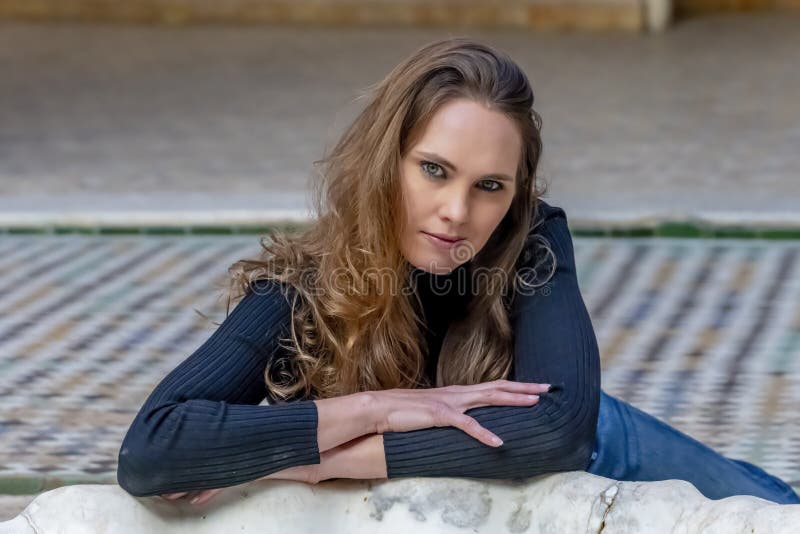 A Lovely Model Poses Inside a Home Environment Stock Image - Image of ...