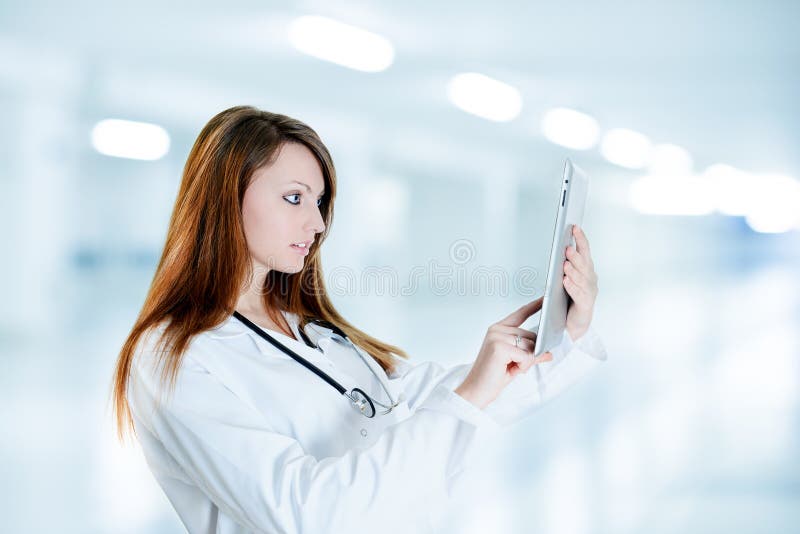 Gorgeous Nurse Using Digital Tablet Stock Photo - Image of practitioner ...
