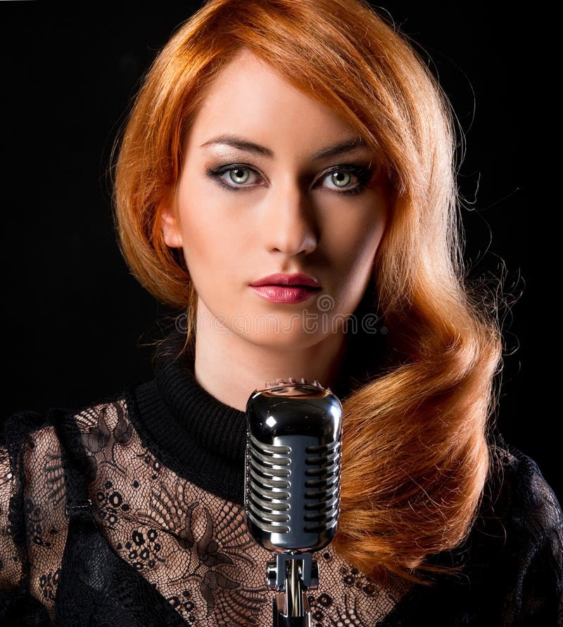 Gorgeous redhead singer stock photo. Image of elegant - 19915598