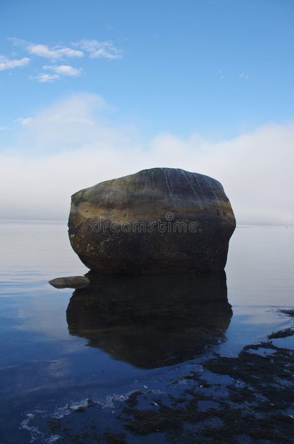 Gorgeous rock in ocean stock image. Image of beautiful - 67184113