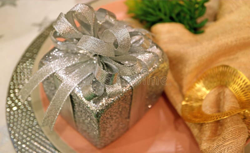 Gorgeous Silver Glitter Square Shaped Gift Box on the Silver Plate ...
