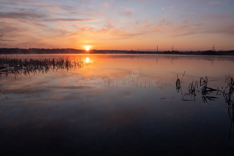 Gorgeous Sunrise Over the Lake with Reflection of the Sun on the Lake ...