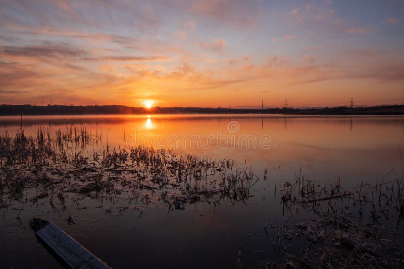 Gorgeous Sunrise Over the Lake with Reflection of the Sun on the Lake ...
