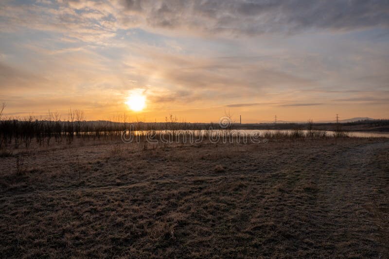 Gorgeous Sunrise Over the Lake with Reflection of the Sun on the Lake ...