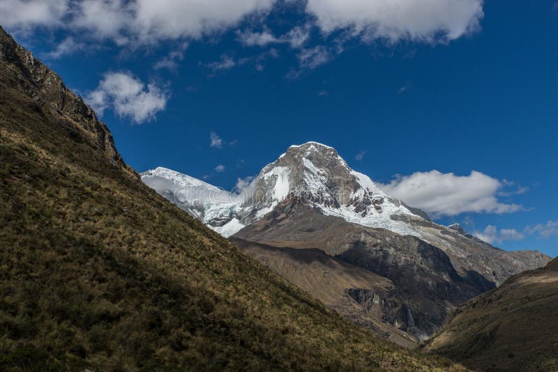 Gorgeous View of a Summit Under a Blue and Cloudy Sky in Peru Stock ...