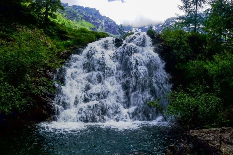 Gorgeous Wide Waterfall with Basin while Hiking Panorama Stock Photo ...