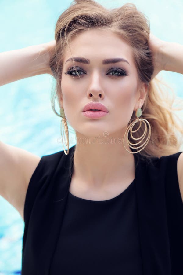 213 Gorgeous Woman Blond Hair Elegant Dress Posing Swimming Pool Stock