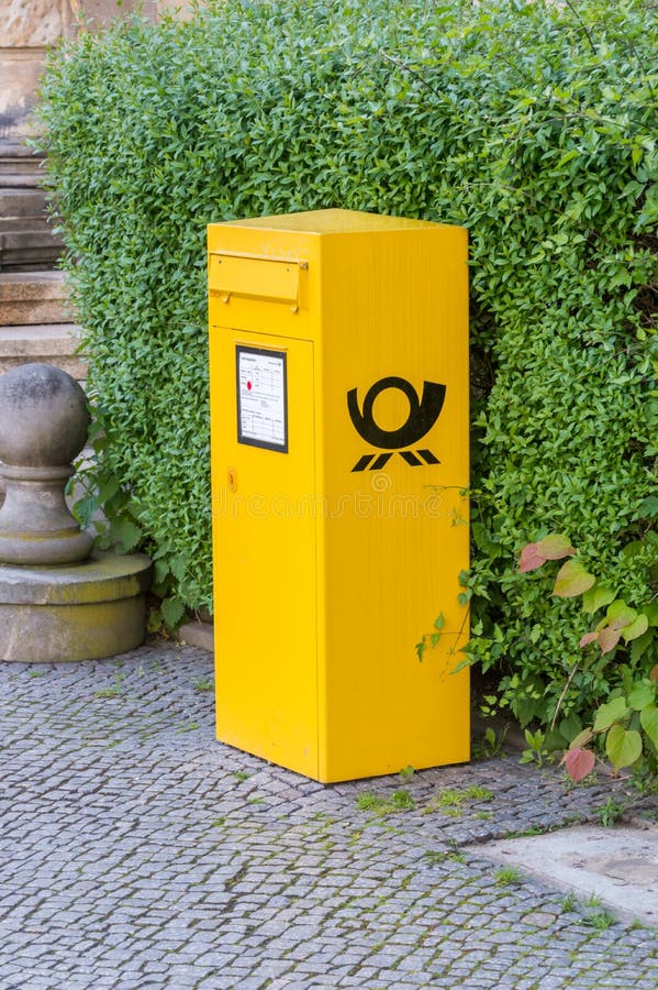 Yellow Mailbox with the German Post Logo Editorial Image - Image of ...