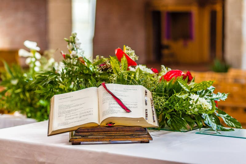 Open Bible on the Altar of Catholic Church Stock Photo - Image of ...