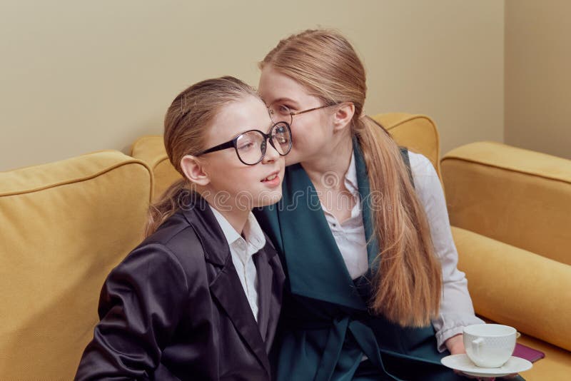 Gossip at Work. Discussion of Colleagues. Two Girls are Talking Stock ...