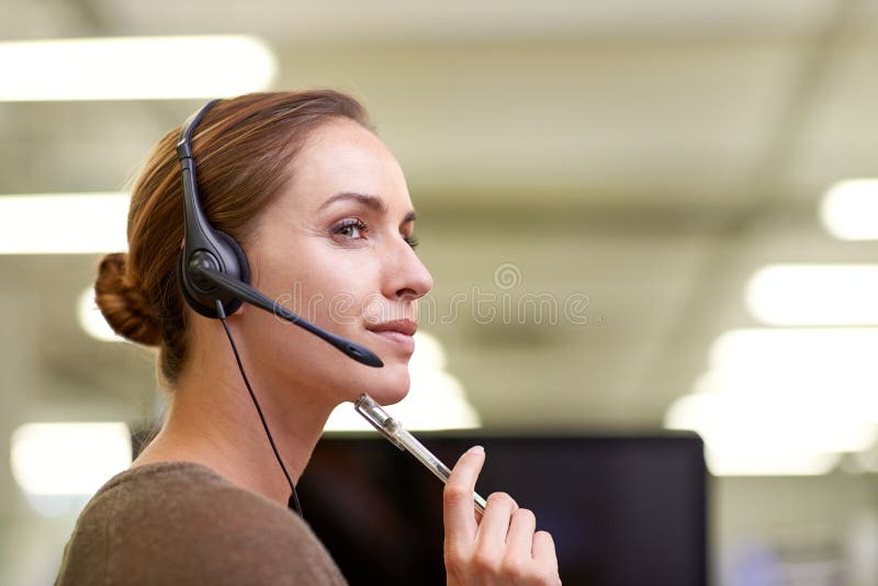 That really Got Me Thinking. an Attractive Call Center Agent Sitting in ...