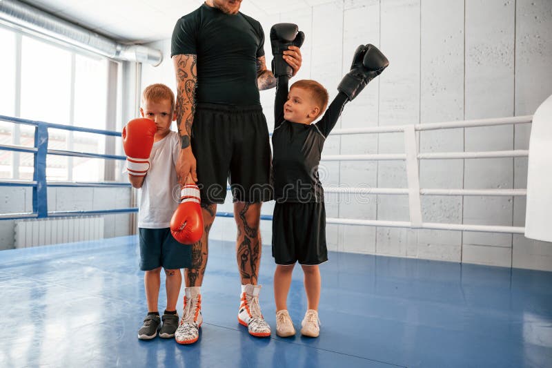 We Got the Winner of the Fight. Young Tattooed Coach Teaching the Kids ...