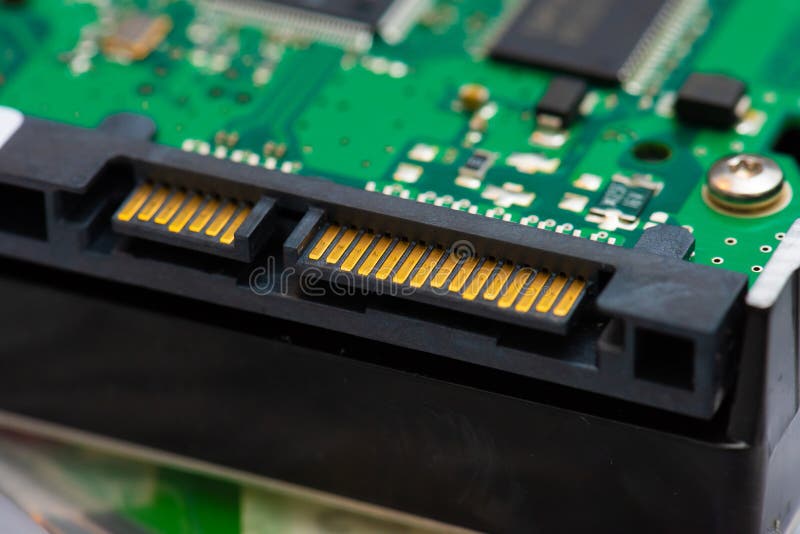 Controller Electronics and Connectors of a SATA Hard Drive.. Editorial ...