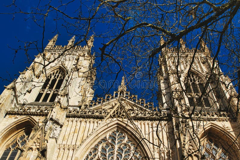 Gothic Cathedral Facade with Intricate Architecture and Blue Sky ...