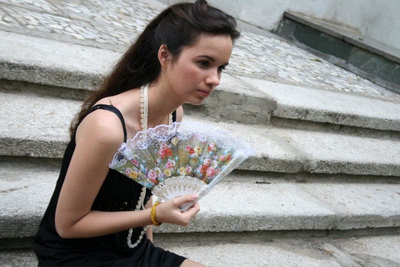 Gothic girl with a fan stock photo. Image of cracked - 10758532