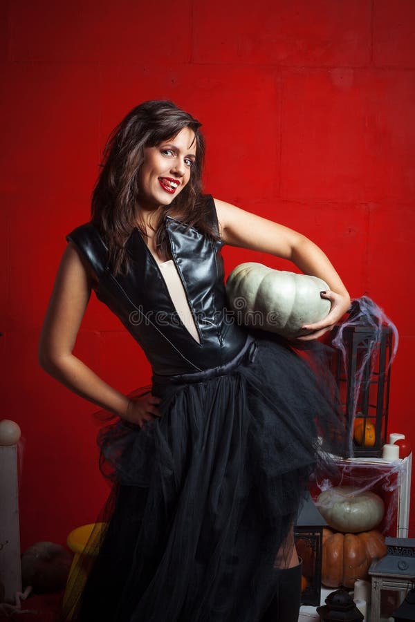 Gothic Girl Image Holding Pumpkin and Smiling Stock Photo - Image of ...