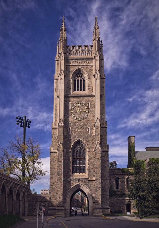 Gothic Tower in Front of Bright Blue Sky with White Cirrus Clouds Stock ...