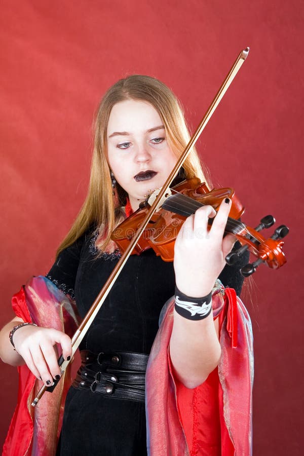 The gothic violinist. stock image. Image of finger, arts - 4837999