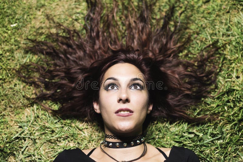 Gothic Man Lying Down in a Park Stock Photo - Image of male, model ...