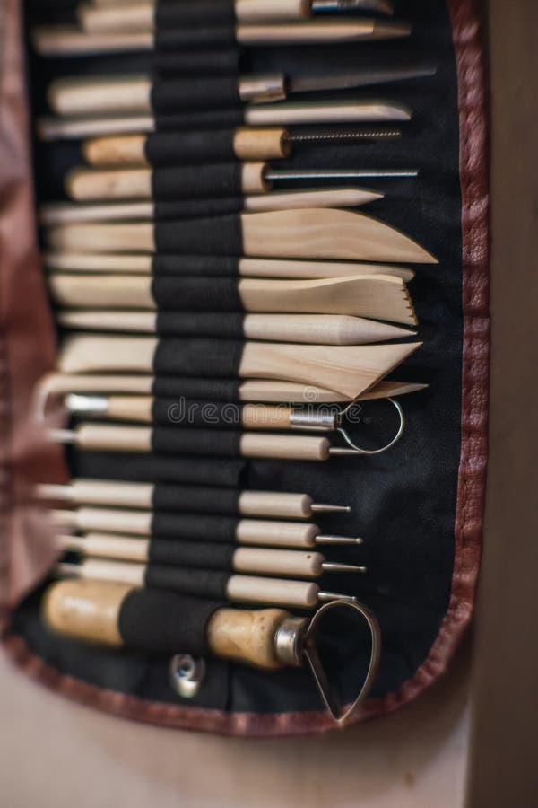 Gouges To Shape Clay Sculptures Stock Photo - Image of arms, gouge: 310819052