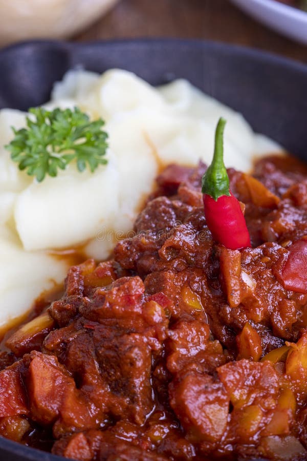 Goulash on wood stock photo. Image of goulash, roasted - 259310494