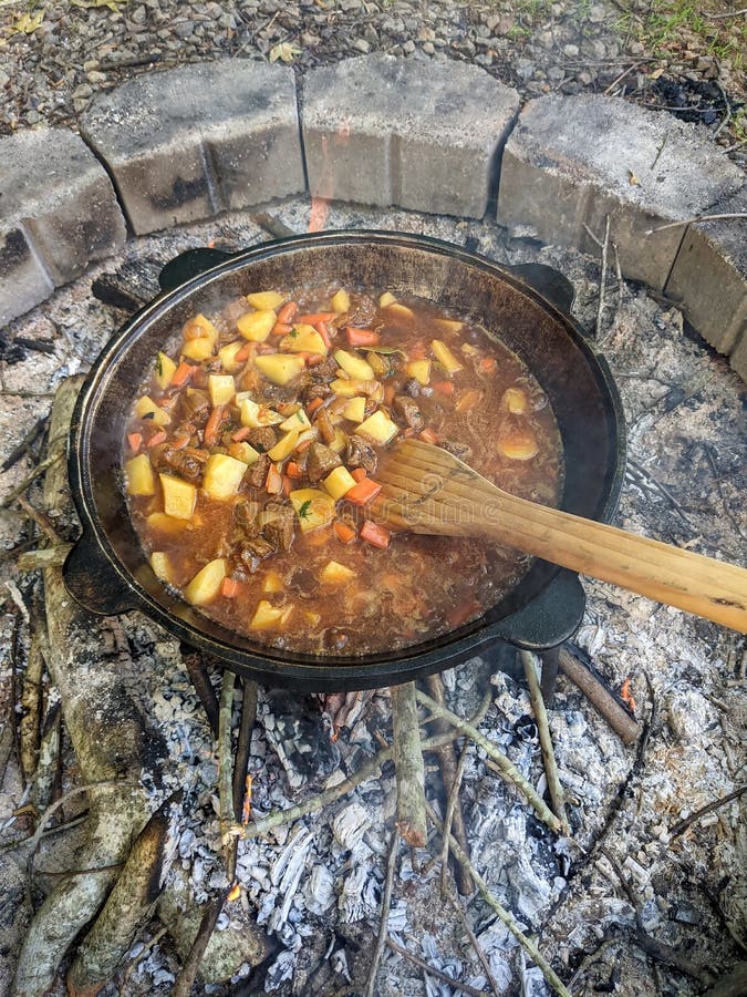 Gourmet Beef Stew Cooked in Cauldron on Outdoor Fire Pit Stock Image ...
