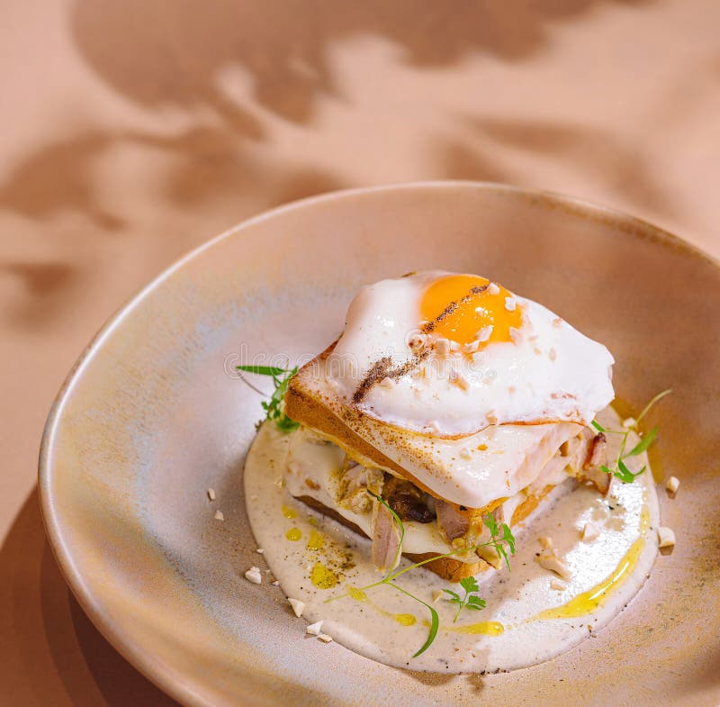 Gourmet Breakfast Stack with Sunny Side Up Egg Stock Photo - Image of ...