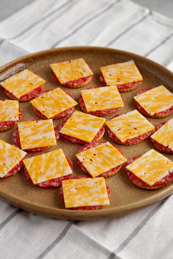 Gourmet Cheese Meat and Crackers on a Plate, Side View Stock Photo ...