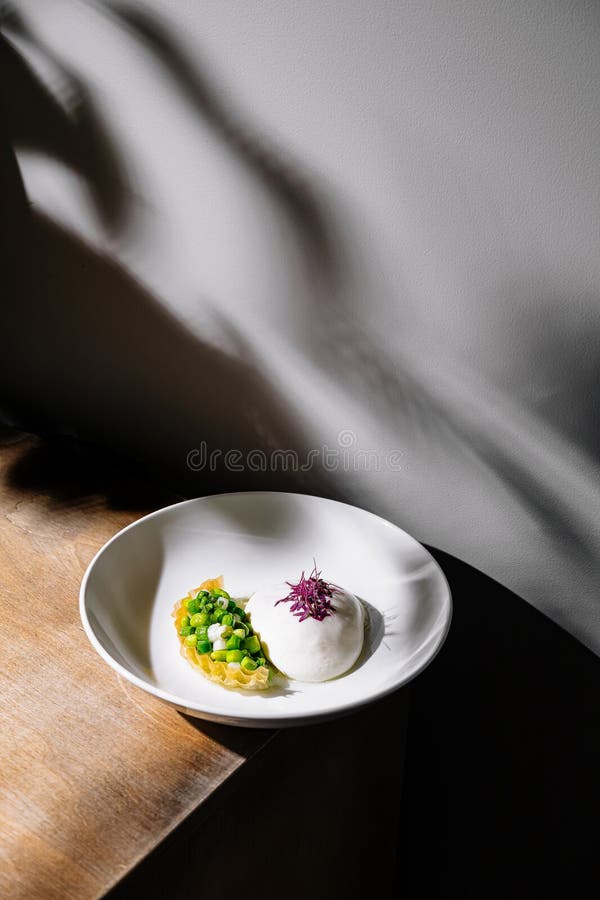 Gourmet Dish with Foam and Vegetables Creating Contrasting Flavors and ...