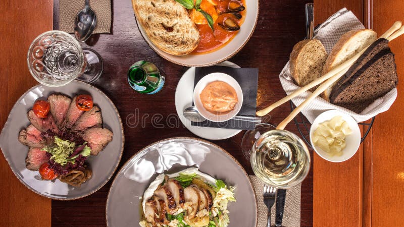 Gourmet Meals Assorted Set on Wooden Table Buffet at Restaurant Stock ...