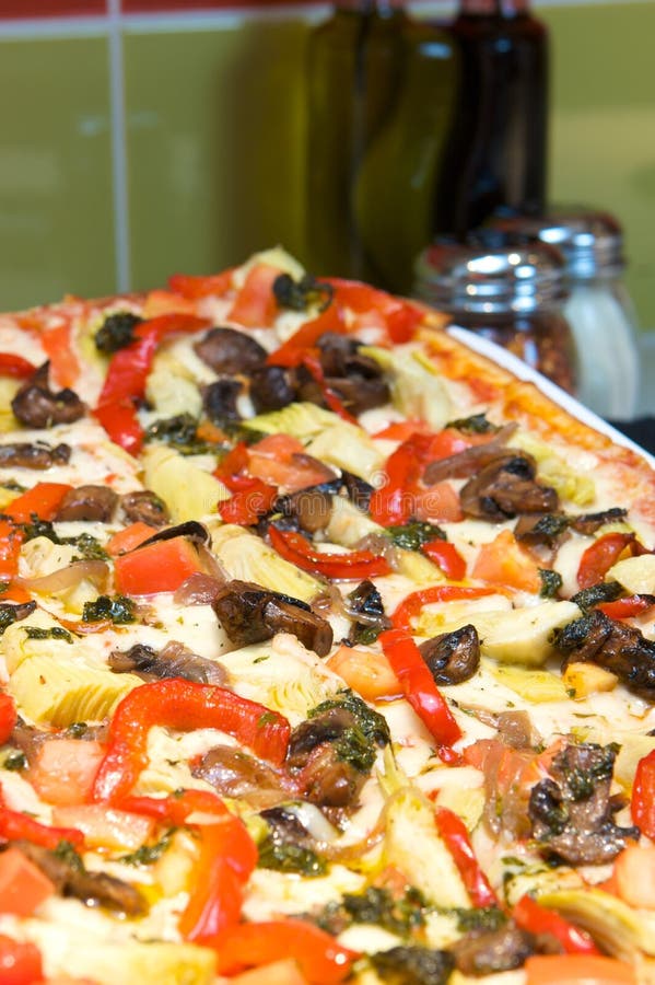 A medium sized Pizza stock photo. Image of pizza, tomatoes - 19456352