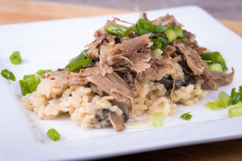 Mushroom Creamy Risotto with Duck Meat on Top Stock Photo - Image of ...