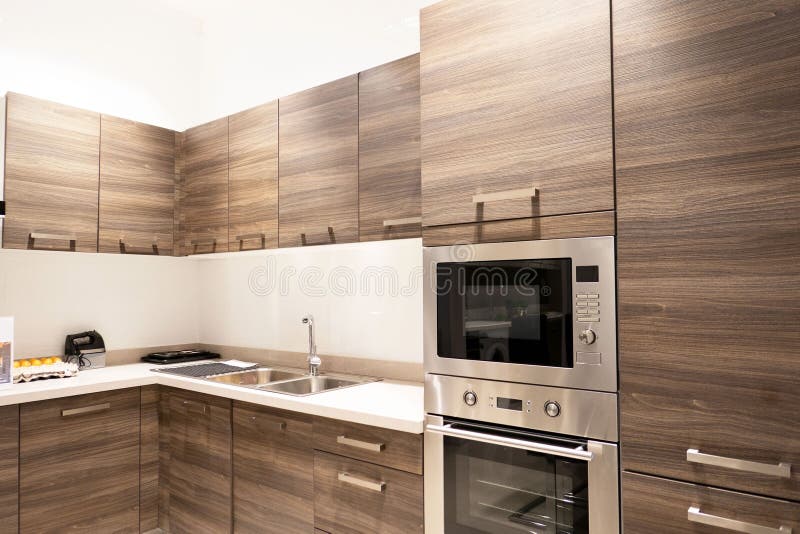 Gourmet New Kitchen Features . Modern Kitchen Interior Stock Image ...