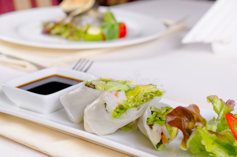 Gourmet Sliced Fresh Spring Rolls with Sauce Stock Image - Image of ...