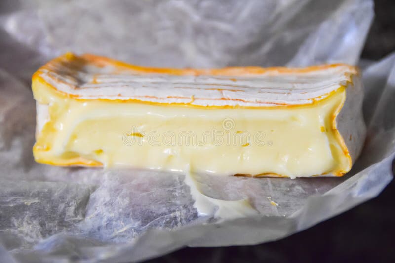 Gourmet Soft Brie Camembert Cheese with an Orange Crust Stock Image ...