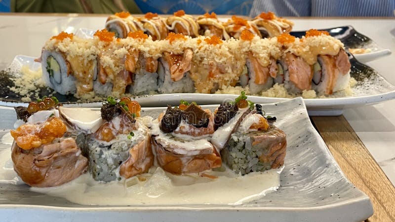 Gourmet Sushi Rolls with Rich Toppings Stock Image - Image of food ...