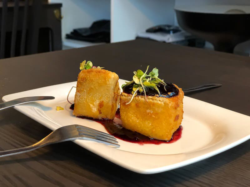 Gourmet Tapa Starter on White Plate in a Restaurant Stock Image - Image ...