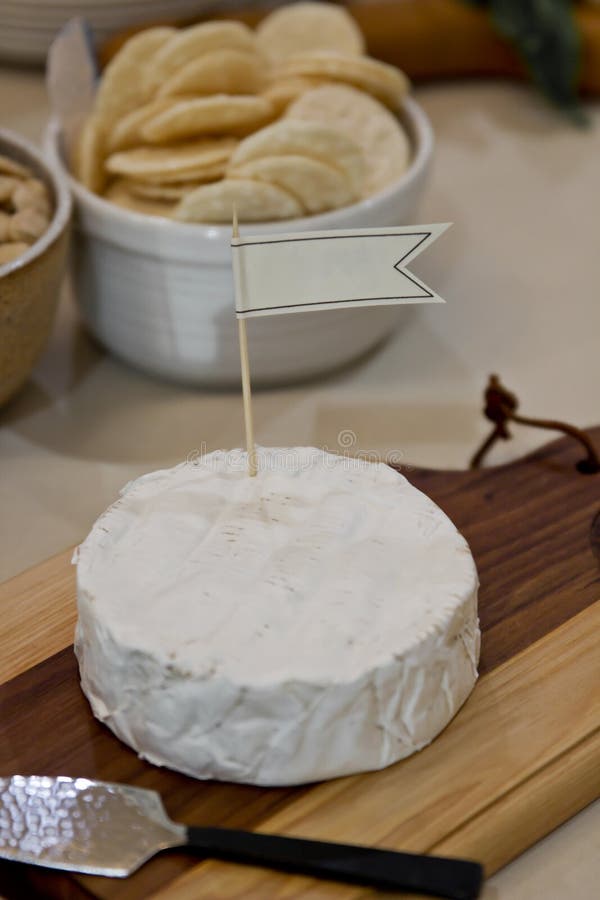Gourmet Wheel Of Soft Cheese With Blank Flag Stock Photo - Image of ...