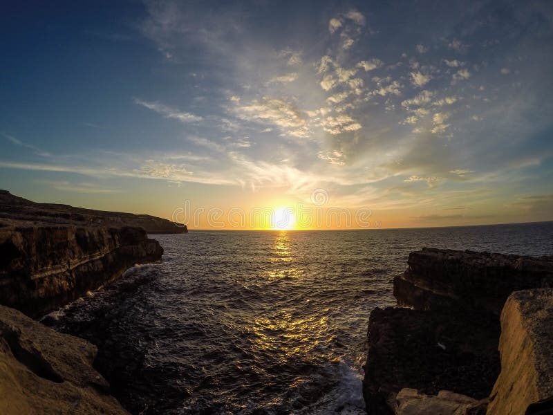 Gozo sunset stock photo. Image of marsalforn, clouds - 93285018