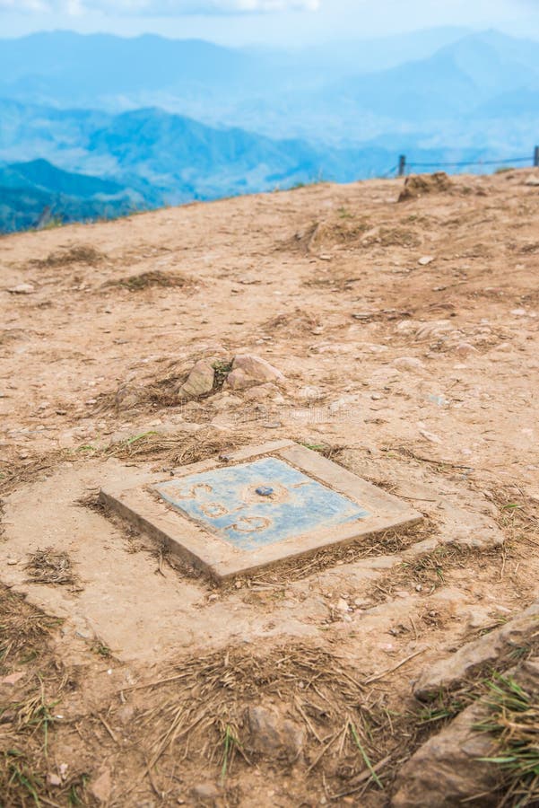 GPS benchmark on mountain stock photo. Image of reference - 246067876