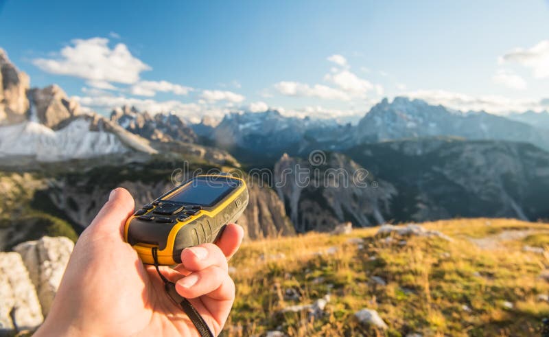 GPS navigator in hand stock image. Image of hand, hiking - 66981223