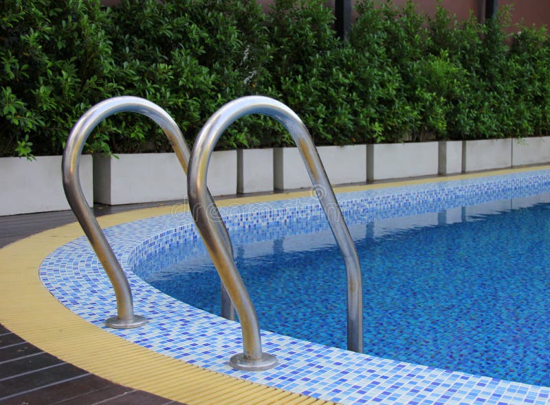 Grab Bars Ladder in Swimming Pool Stock Photo - Image of outdoors ...
