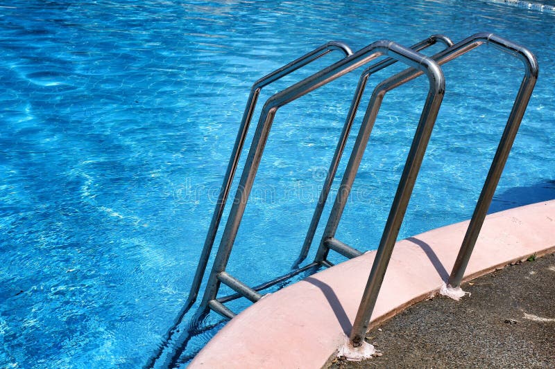 Grab Bars Ladder in the Swimming Pool Stock Photo - Image of luxury ...