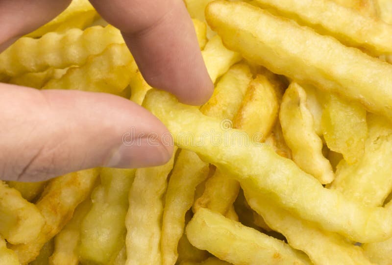 Grabbing Crinkle French Fry Stock Image - Image of delicious, potato ...