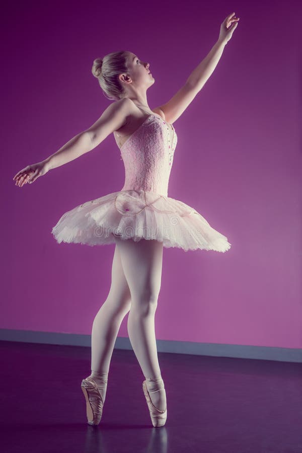 Graceful Ballerina Dancing En Pointe Stock Image - Image of gorgeous ...