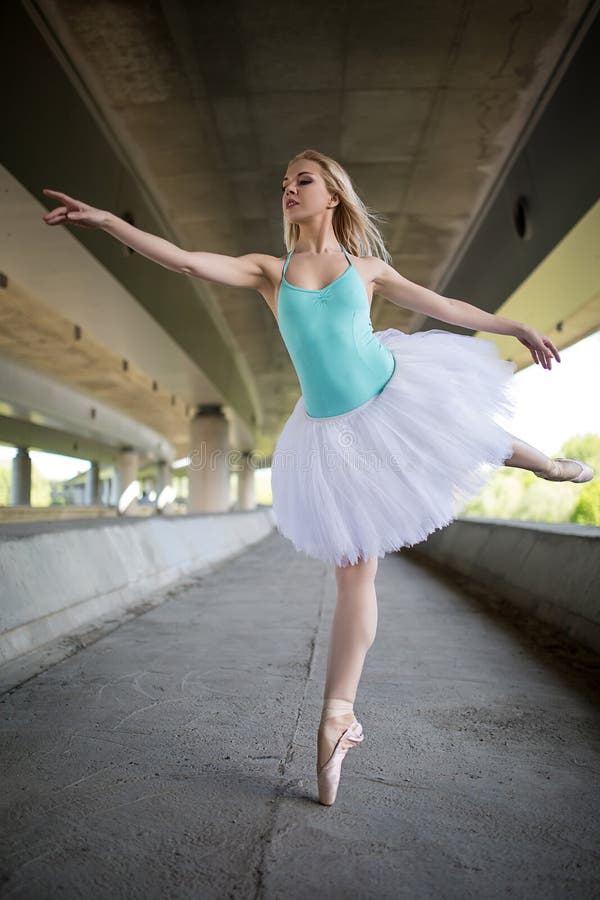 Graceful Ballerina Doing Dance Exercises on a Stock Image - Image of ...