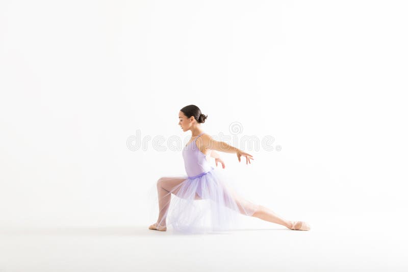 Side View of Female Dancer Posing while Performing Ballet Dance Stock ...