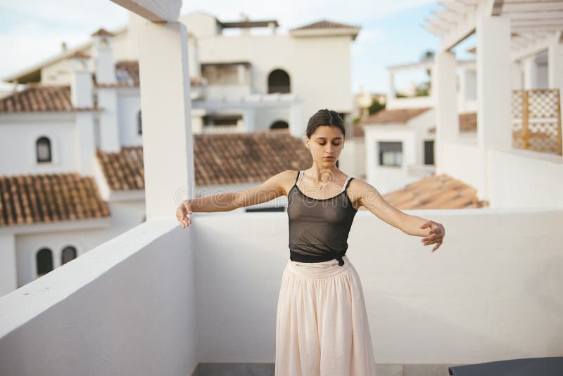 Graceful Dance Posing Elegantly on a Beautiful Terrace with a Stunning ...