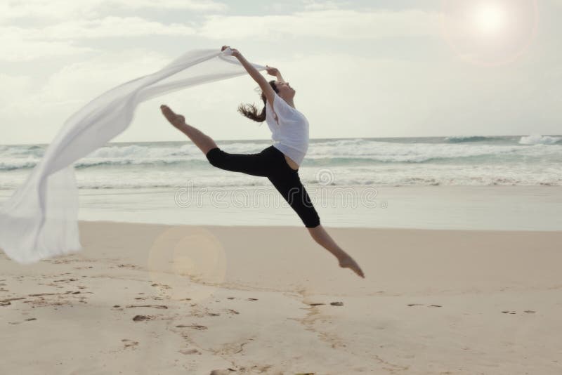 Graceful dancer on beach stock image. Image of movement - 14130923